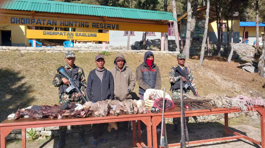 Three hunters held with weapons